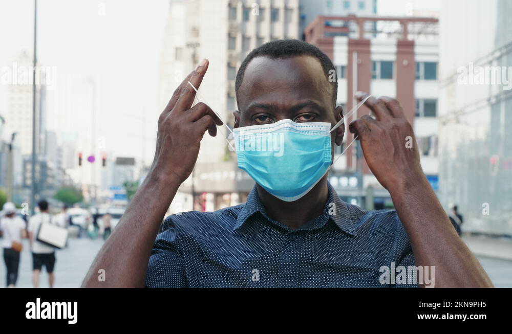 Man taking off mask Stock Videos & Footage - HD and 4K Video Clips - Alamy