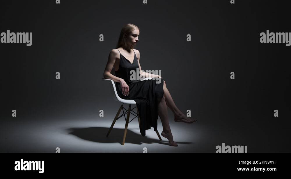 Woman one leg up on chair Stock Videos & Footage - HD and 4K Video ...