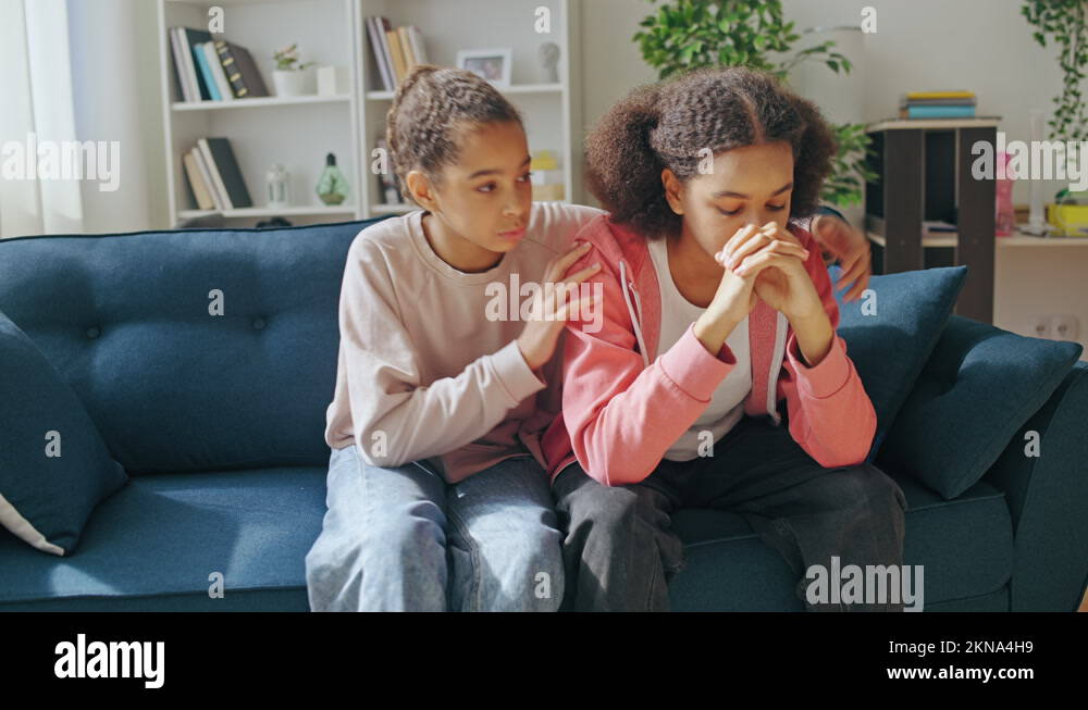 Sibling comforting Stock Videos & Footage - HD and 4K Video Clips - Alamy