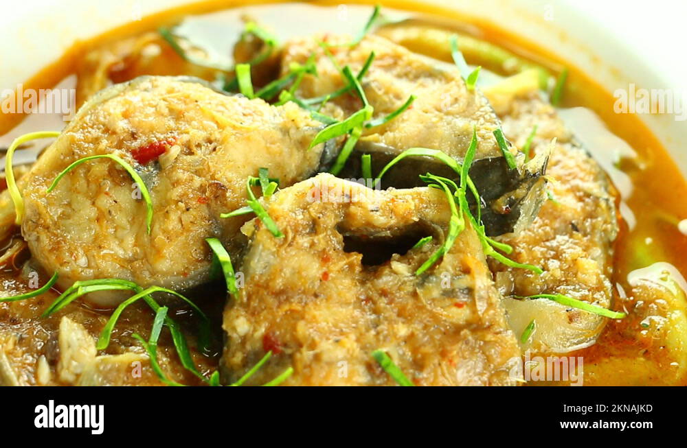 Fried cat fish with chili paste in plate , in door Chiangmai Thailand ...