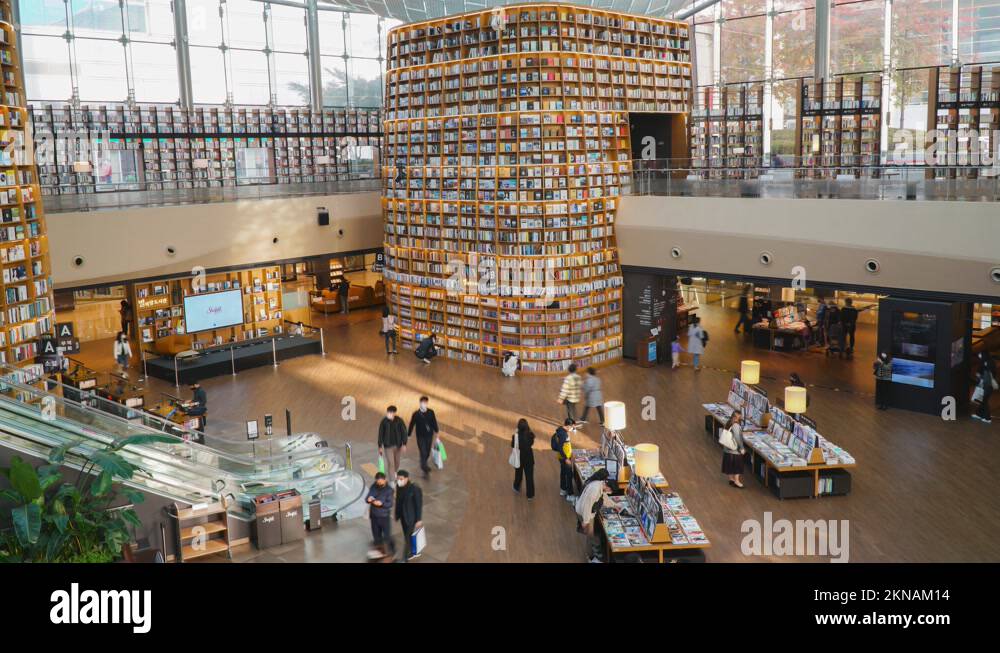 People move around watching and choosing books in Starfield Library in ...