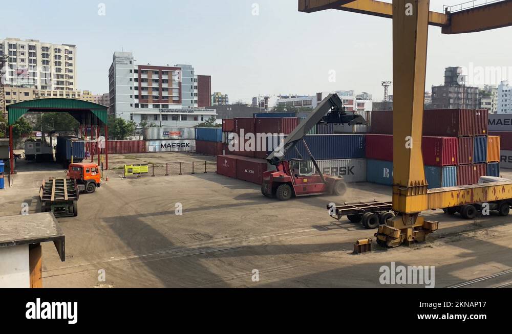 Crane loading heavy MAERSK containers at Dhaka inland container depot ...