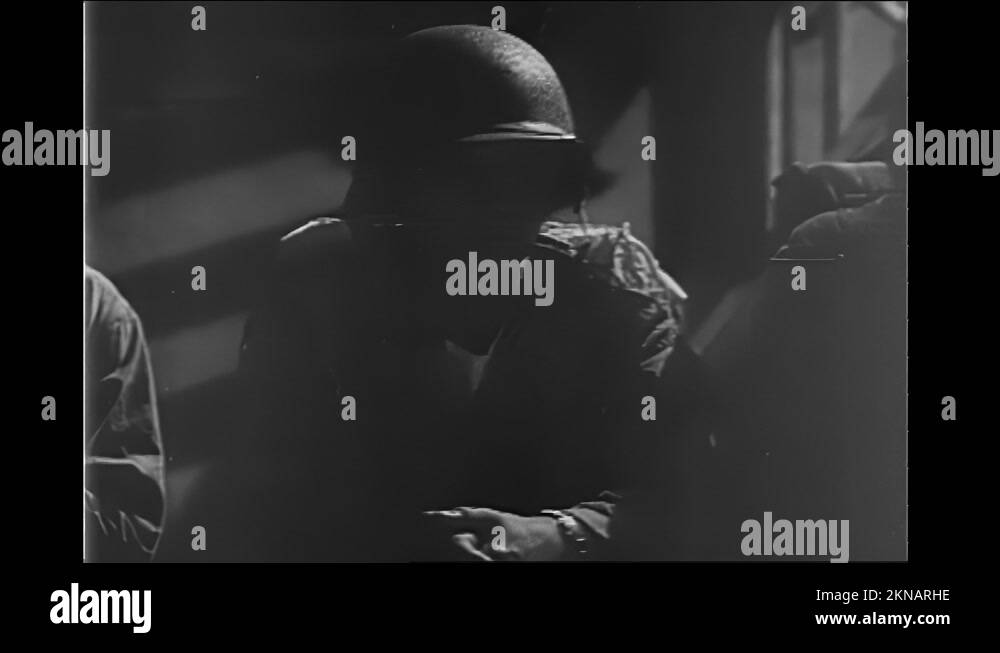 1940s: Soldiers leaning on railing. Soldiers in uniform. Soldier ...