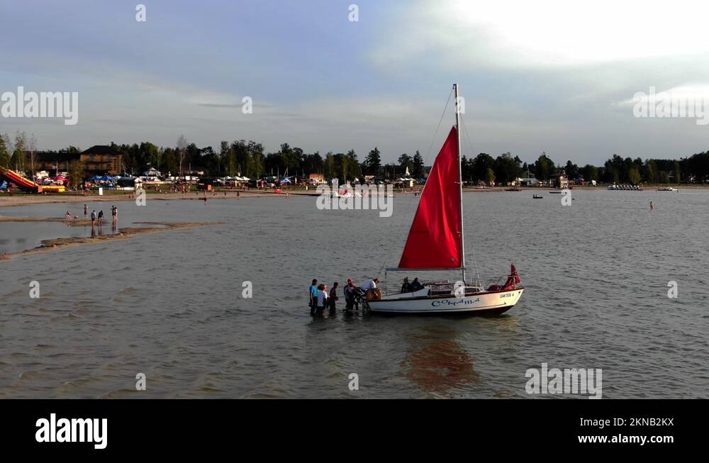 A group of friends about to set sail. They are about to board the ...