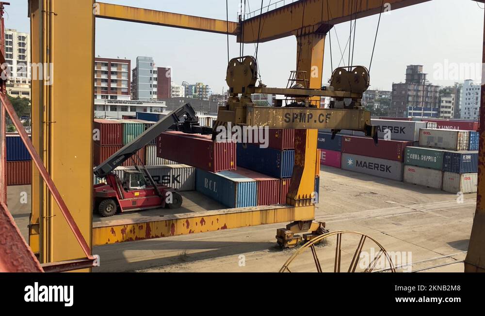 Crane lifting heavy MAERSK containers at Dhaka inland container depot ...