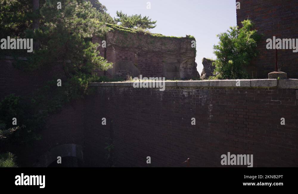 Seaside Fort of Tomogashima Island, Pan over red brick ruins, Japan ...