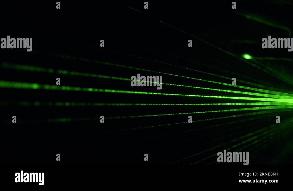 Dust particles in green laser light beam from diffraction grating ...