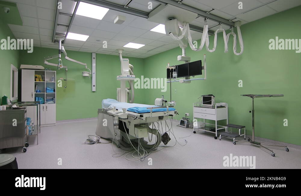 Hospital scene of empty surgical operating clinical room with switched ...