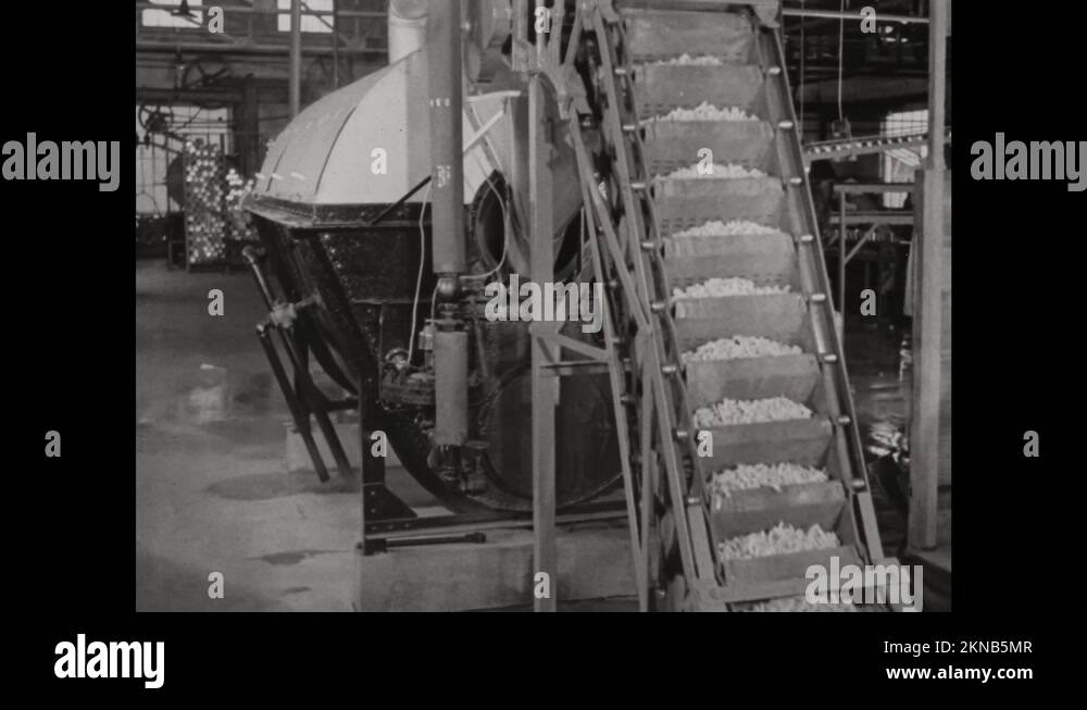 1930s: Beans moving up conveyor into blancher. Title card. Beans ...