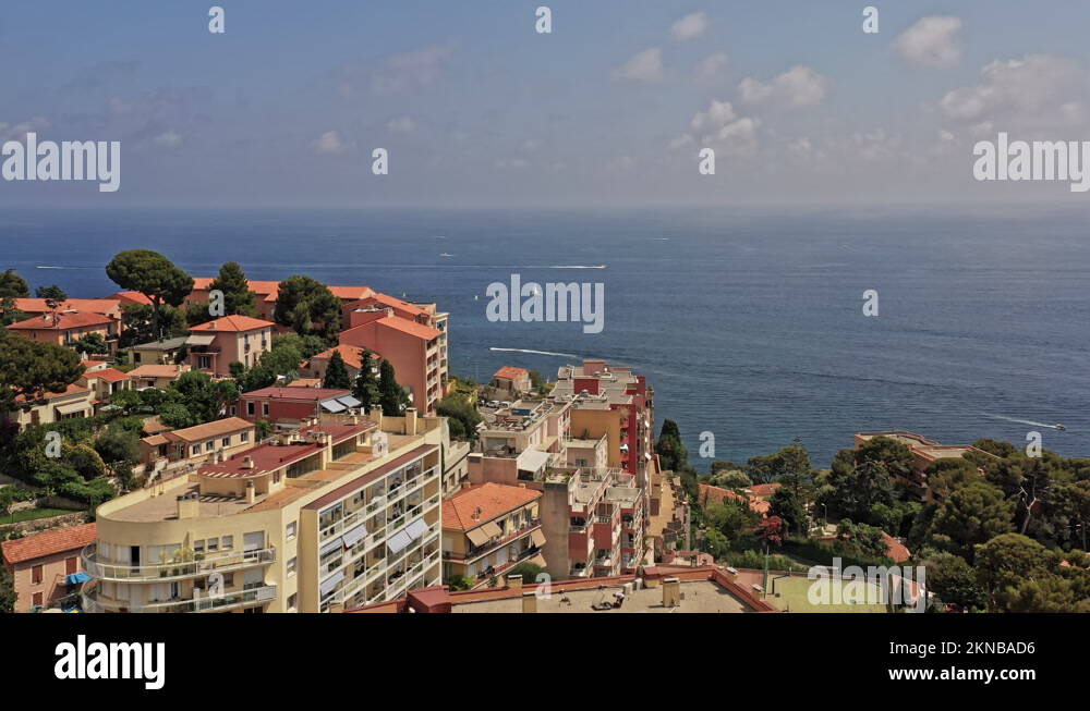 Cap d'Ail France Aerial v1 cinematic drone low level flyover hillside ...