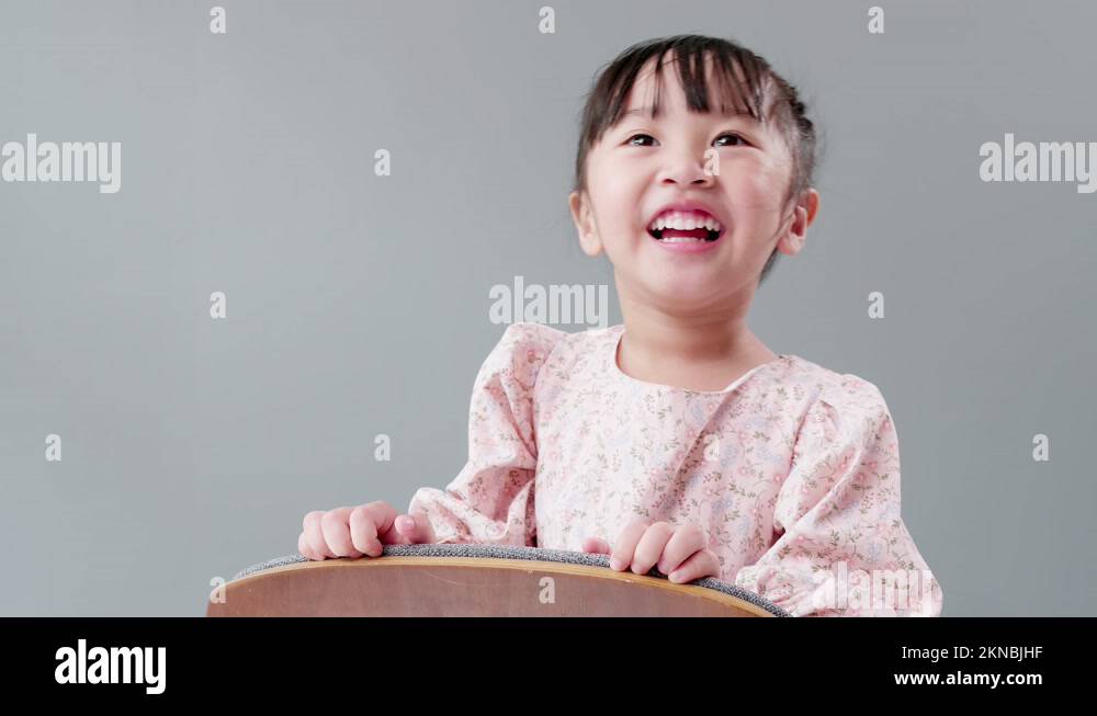 Child behind chair Stock Videos & Footage - HD and 4K Video Clips - Alamy