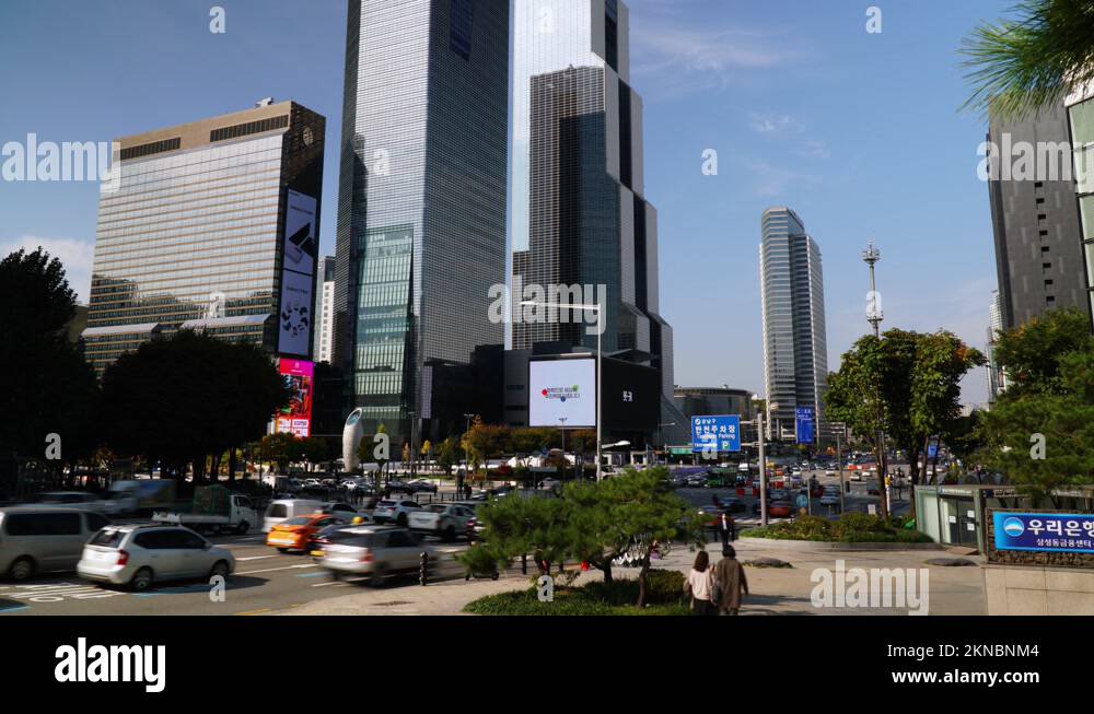 Traffic and pedestrian time-lapse near WTC Seoul, South Korea near the ...