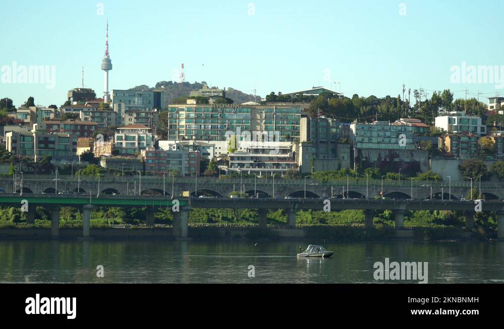 The Hangang River and Namsan Tower in Seoul, South Korea with traffic ...