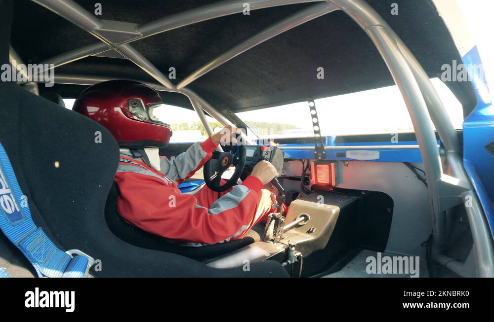 Race car driver behind wheel Stock Videos & Footage - HD and 4K Video Clips - Alamy