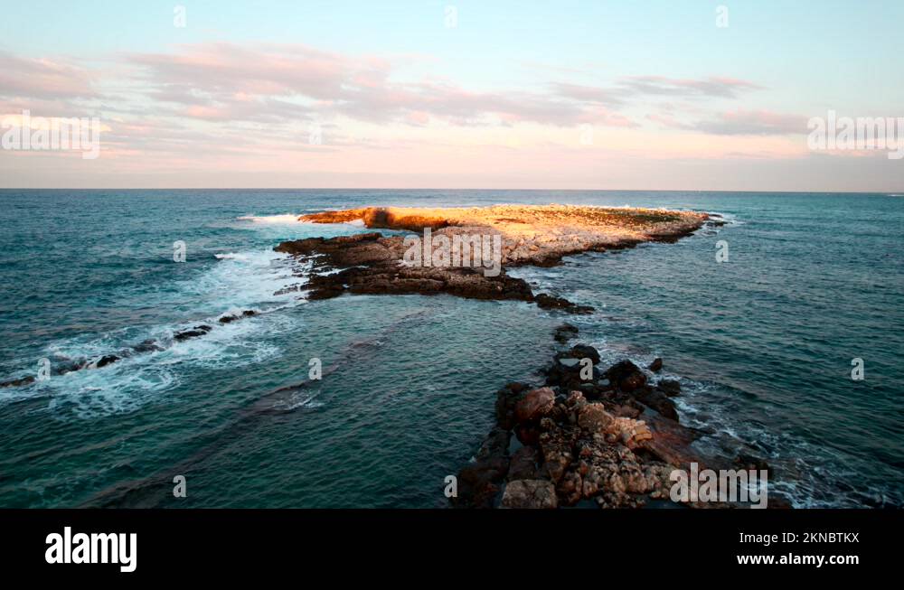 Drone Aerial Of Qawra Point Beach At Sunset, St Paul's Bay, Bugibba ...