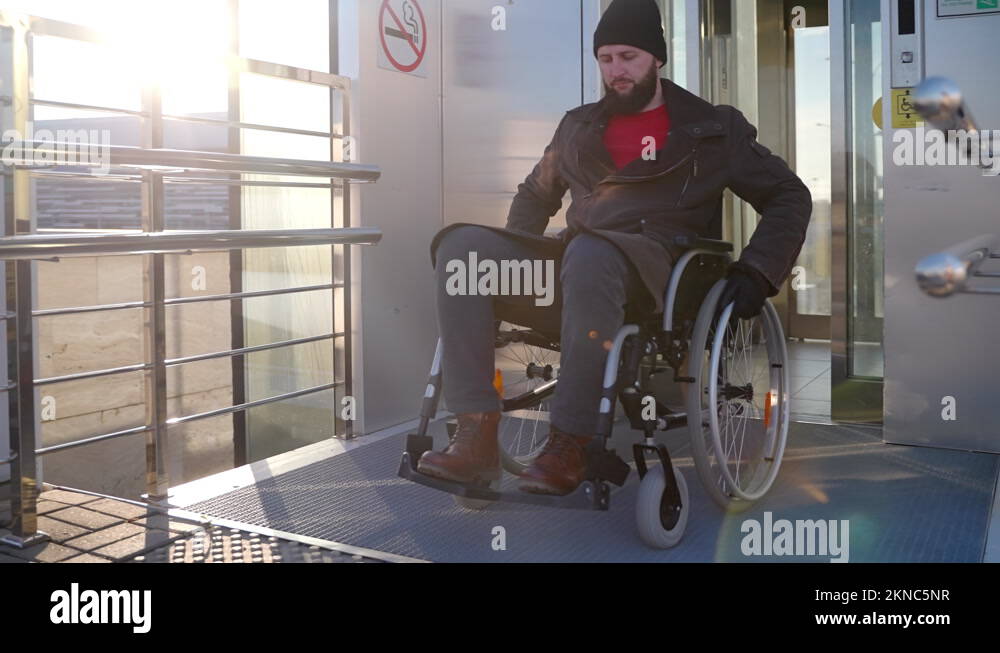 Man in wheelchair got over city stairs with elevator for disabled ...