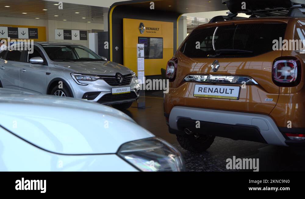 Renault Duster SUV in gold color with roof rack at Renault showroom ...