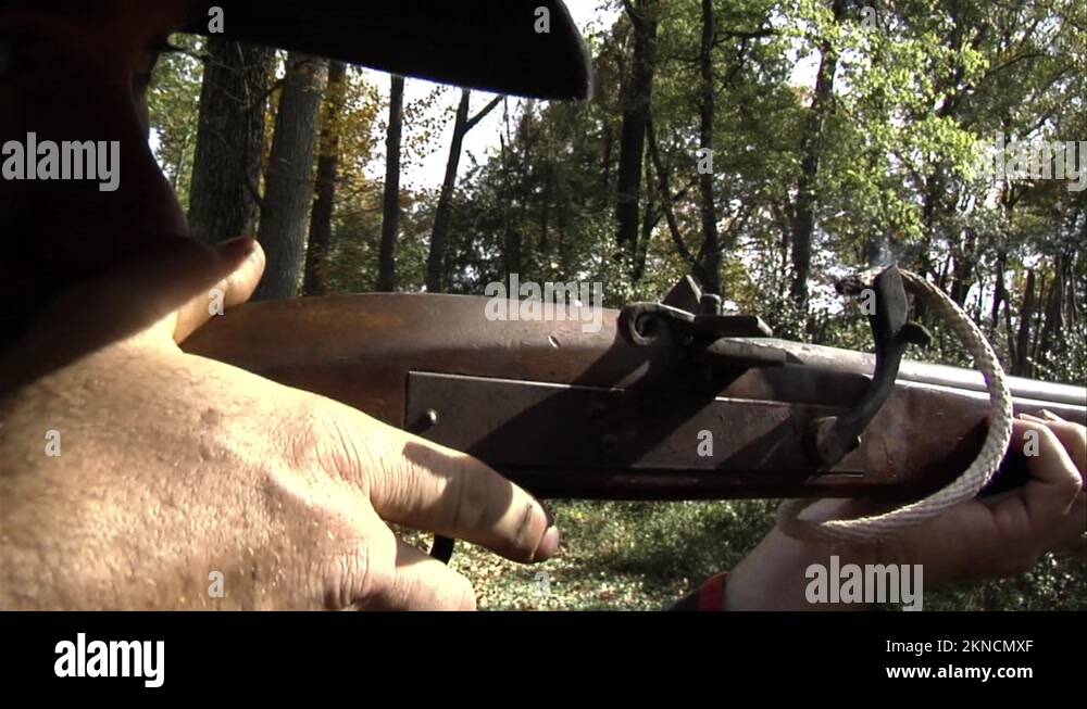 17th century Colonial American Militia Soldier Fire a Matchlock ...