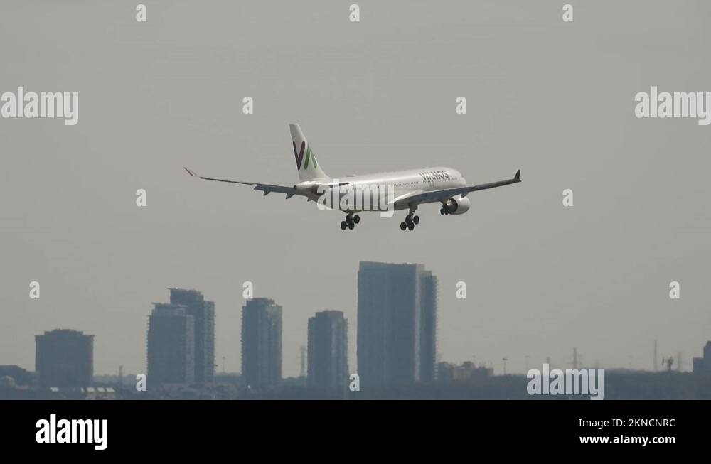 Airliner In Flight Approaching To Land At The Runway Of Toronto Pearson ...