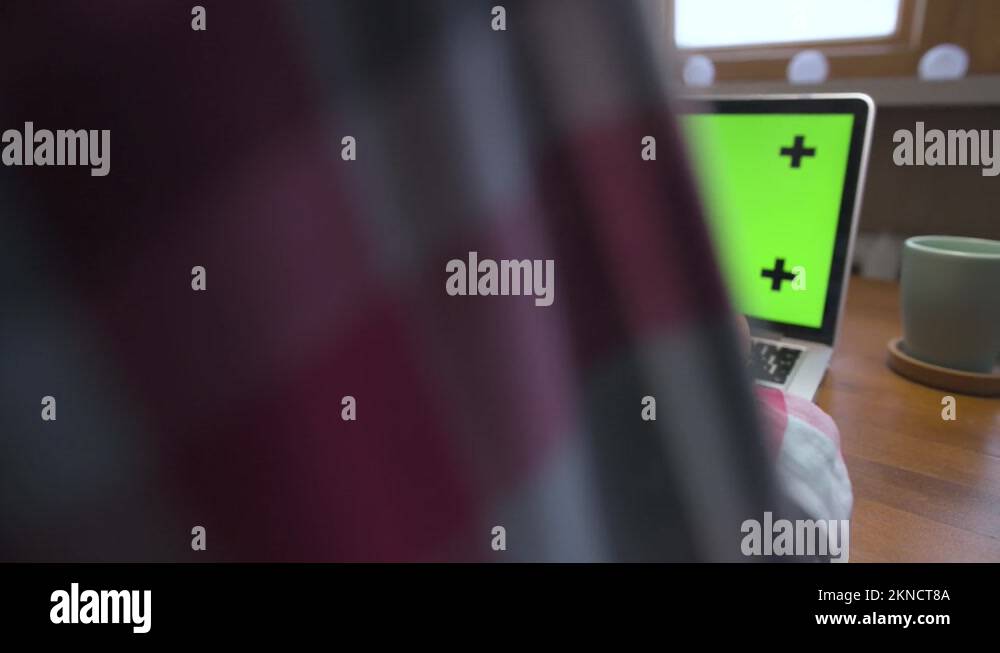 Woman hands typing and scrolling on a trackpad in a laptop computer ...