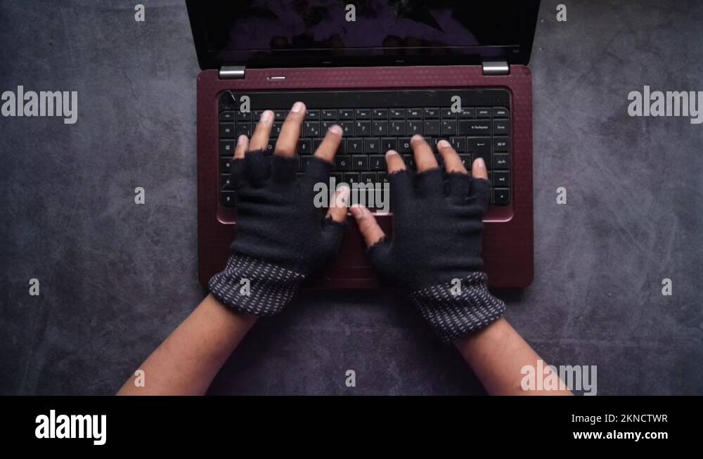 hacker hand stealing data from laptop top down Stock Video Footage - Alamy