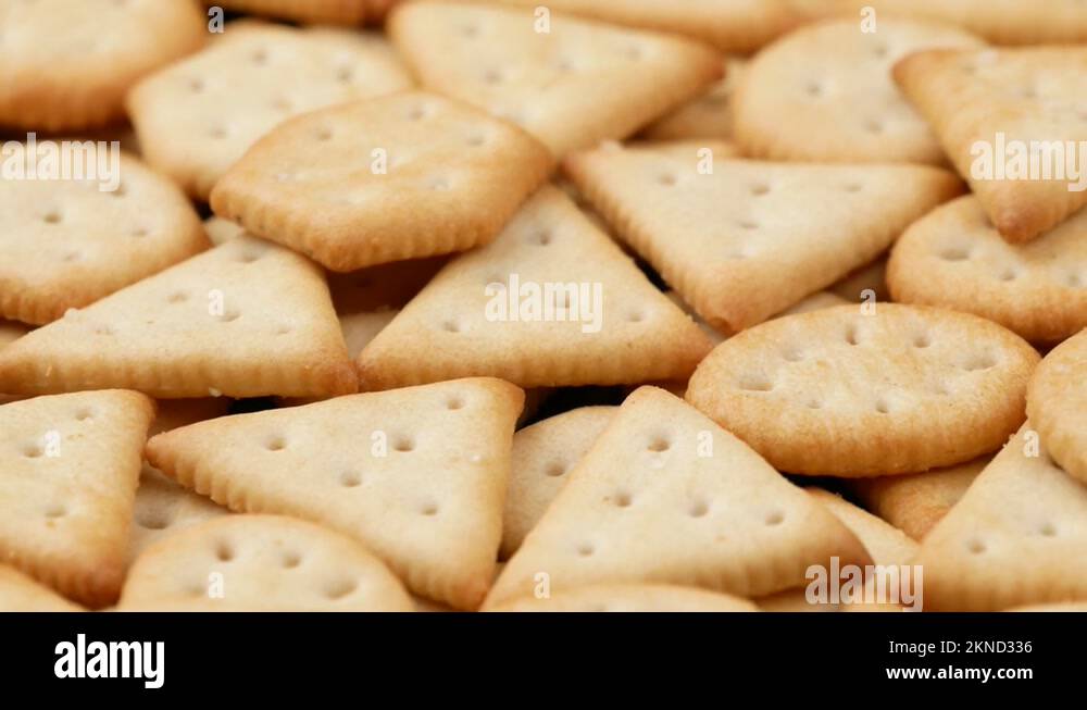 Salty cracker, side view. Cracker of different shapes, dolly shot Stock ...