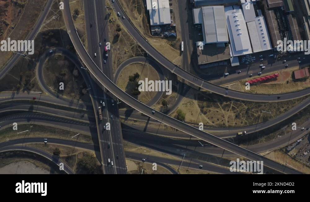 Bird's eye view of ring road with multiple car driving Stock Video Footage - Alamy