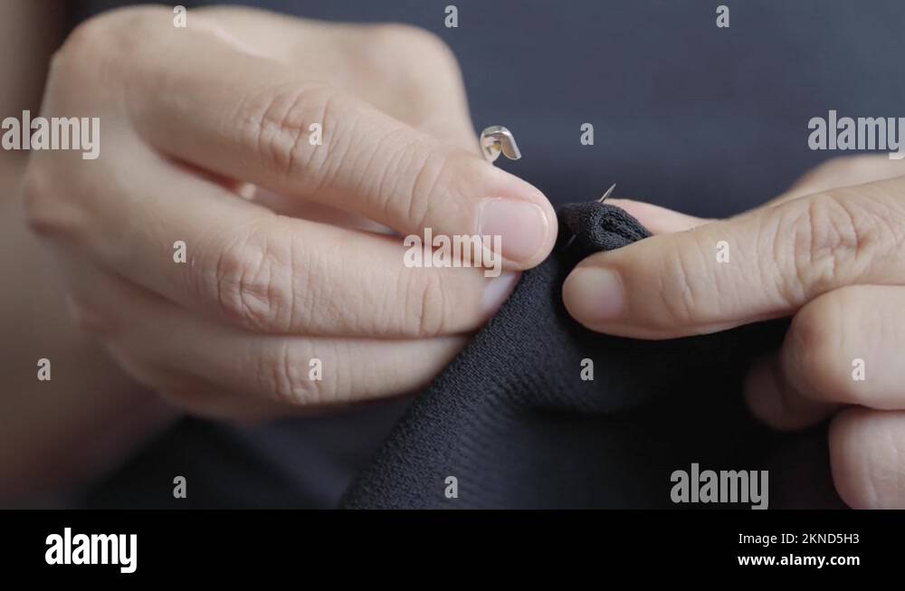 Safety pin cloth Stock Videos & Footage - HD and 4K Video Clips - Alamy