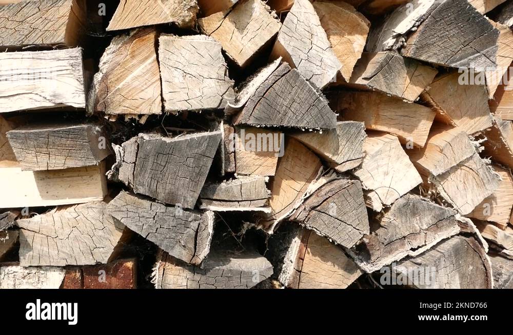 Stacked wooden logs stacked firewood Stock Videos & Footage - HD and 4K ...