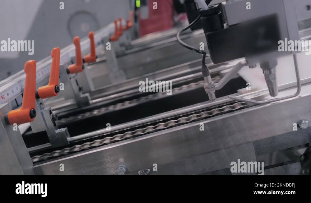 Cardboard sheet moving on conveyor line of automatic carton box making ...