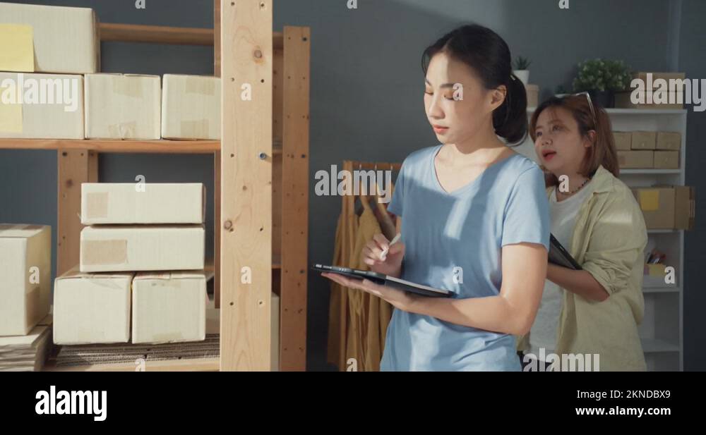 Lady hold tablet check stock inventory product control delivery to ...