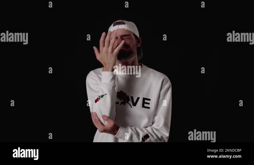 Trendy 20s Man shaking head giving extreme facepalm, wide, black ...