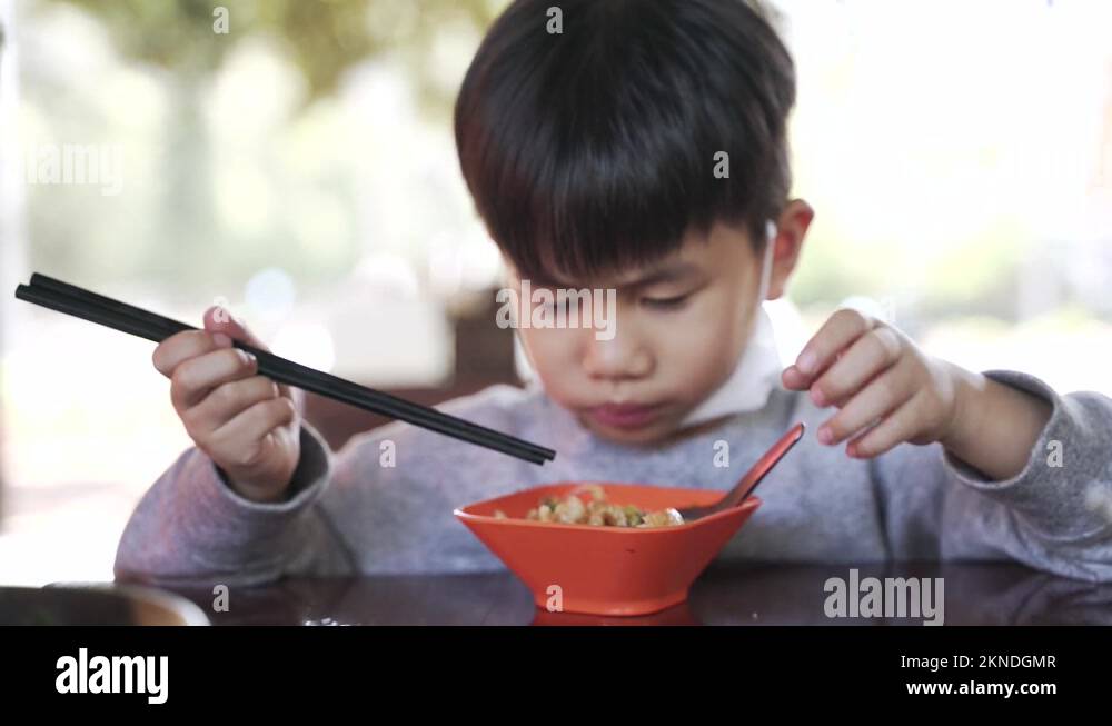 Boy eating with chopsticks Stock Videos & Footage - HD and 4K Video ...