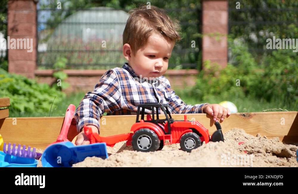 Child tractor sand Stock Videos & Footage - HD and 4K Video Clips - Alamy