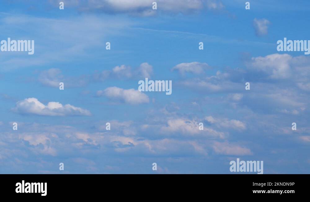 Growing and swelling dramatic slow Cumulus and Altostratus cloud ...
