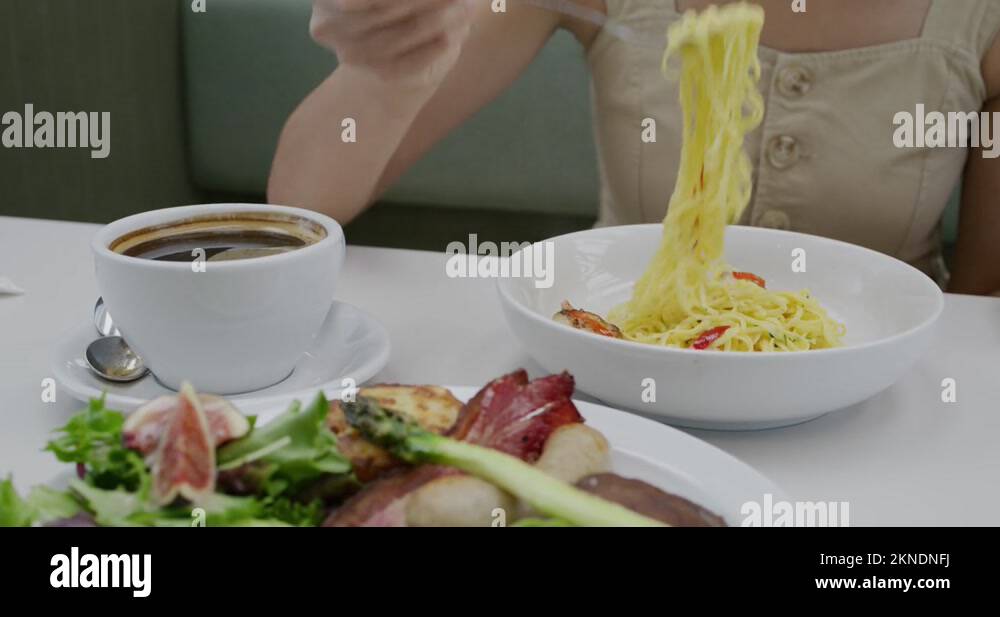 Woman enjoy pasta Stock Videos & Footage - HD and 4K Video Clips - Alamy