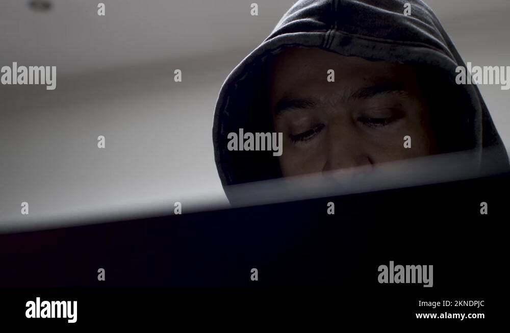 Hacker behind computer Stock Videos & Footage - HD and 4K Video Clips ...