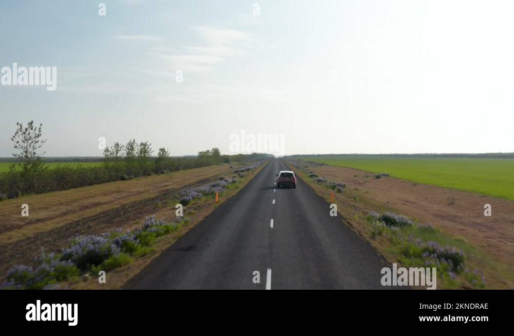 Birds eye tracking car driving on Ring road, most important highway in Iceland Stock Video ...