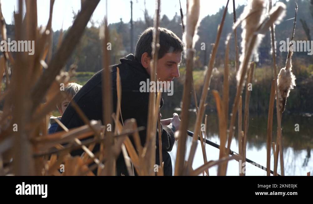 Fisherman Fishing Rod Fisher. Father and Child Kid Rest near Lake Pond ...