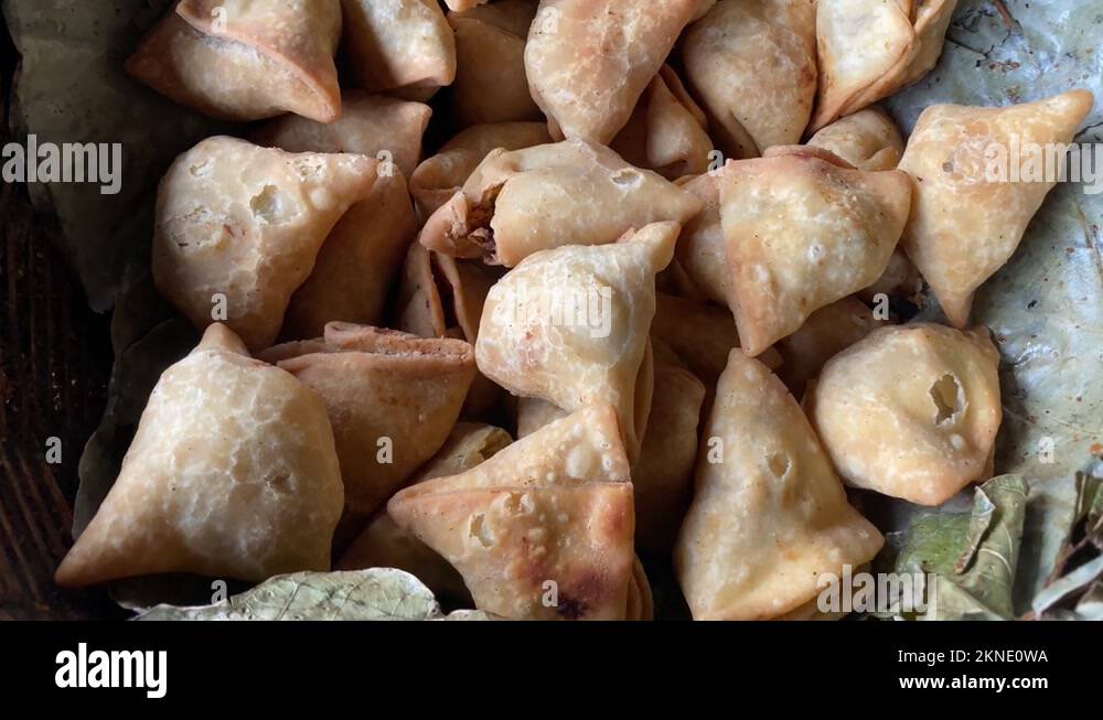 Bengali samosa Stock Videos & Footage - HD and 4K Video Clips - Alamy
