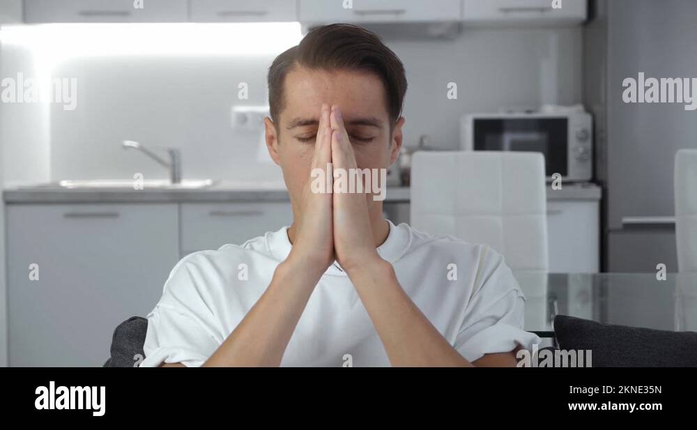 Sad man asking for help about problem, praying to God. Religious male ...