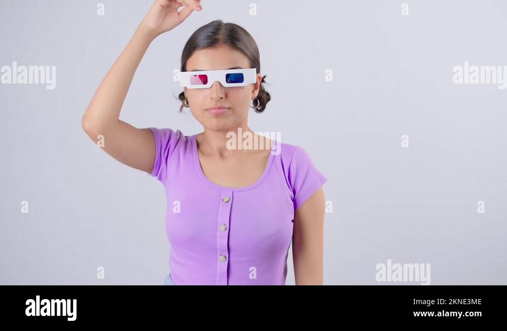 Indian Asian old fashioned female wearing 3D glasses & dancing by ...