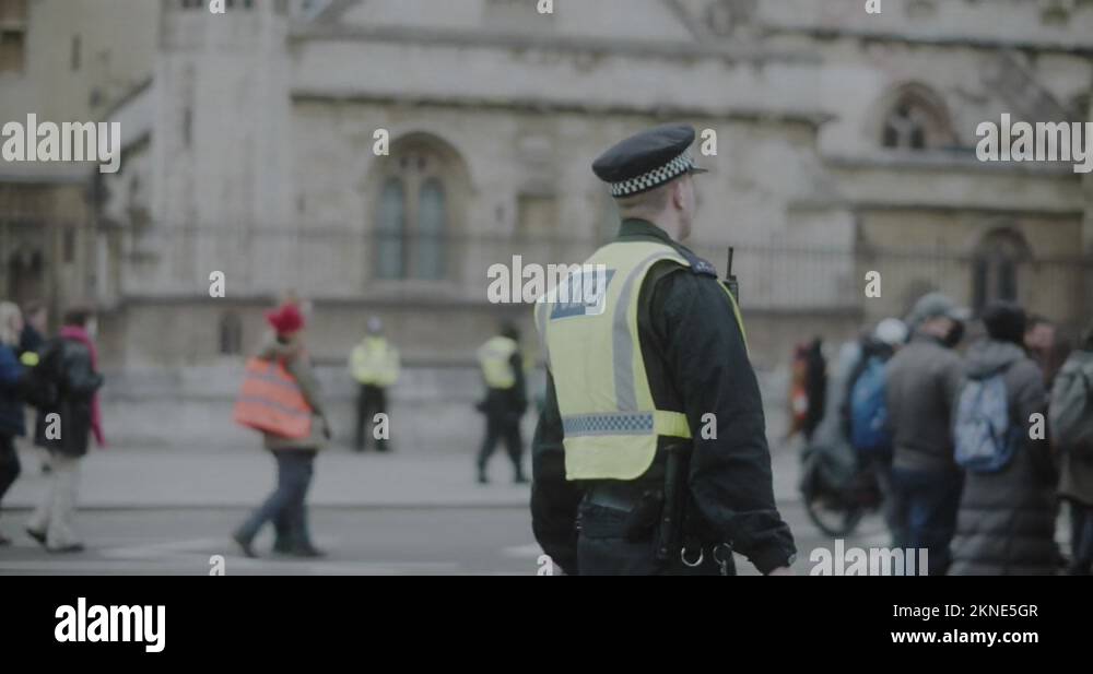 Police officer uniform on duty crowd walking Stock Videos & Footage ...