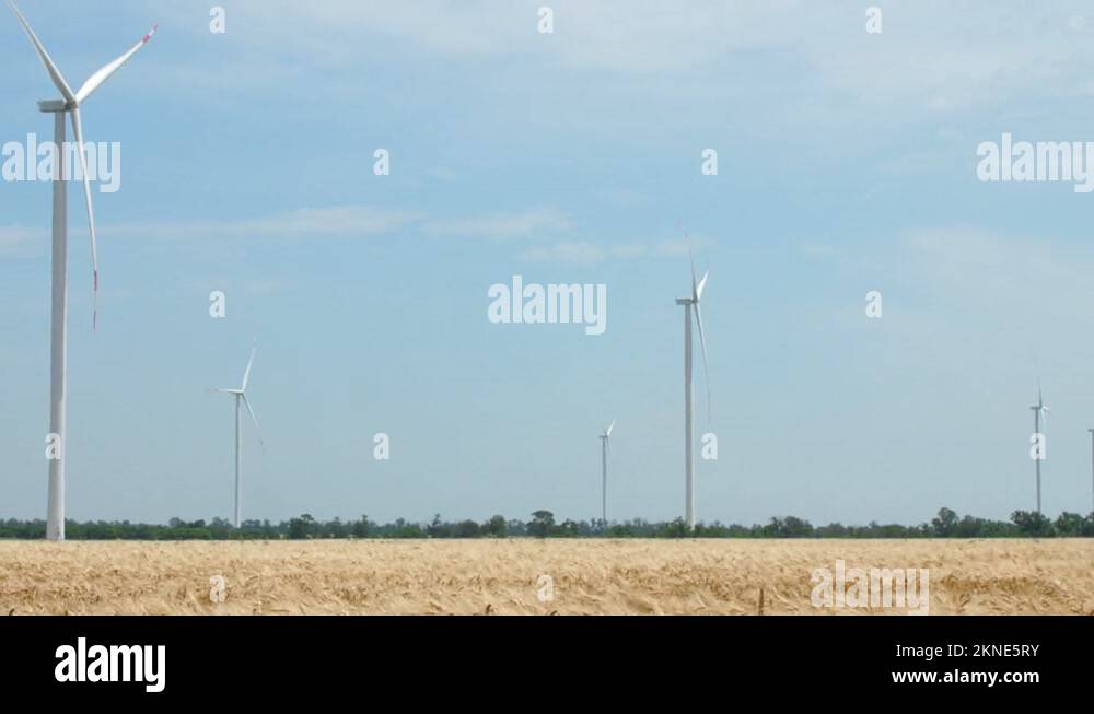 Wind driven generators produce power at rural station Stock Video ...