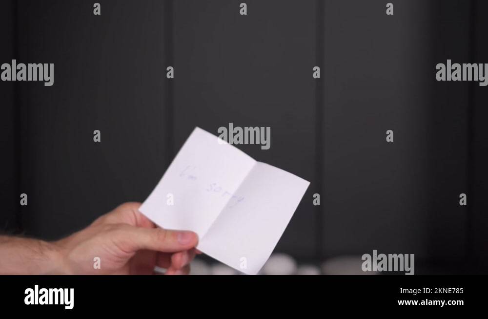 burn note sorry. in fire handwritten letter. burn in lighter fire ...