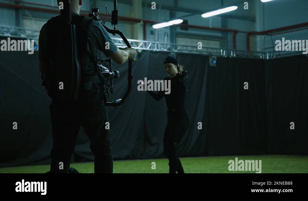 Actors in motion capture suits performing some fight moves as a game ...