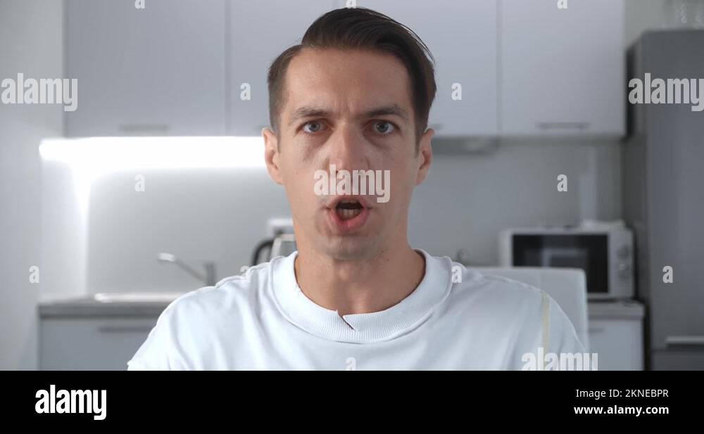 Angry man scolding and shouting at employees threatening with a finger ...