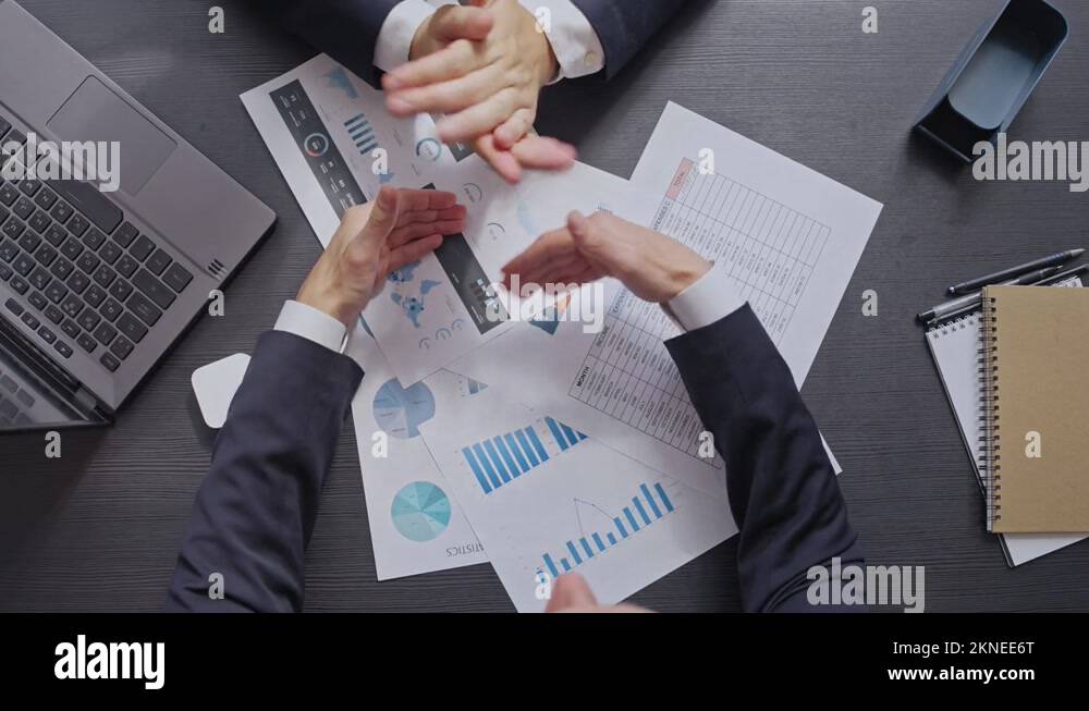 Boss scolding nervous employee for errors in report, businessmen ...