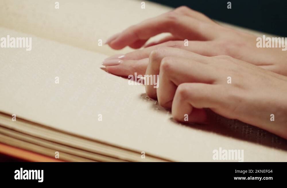 Blind woman reading braille book top view, poorly seeing female person ...