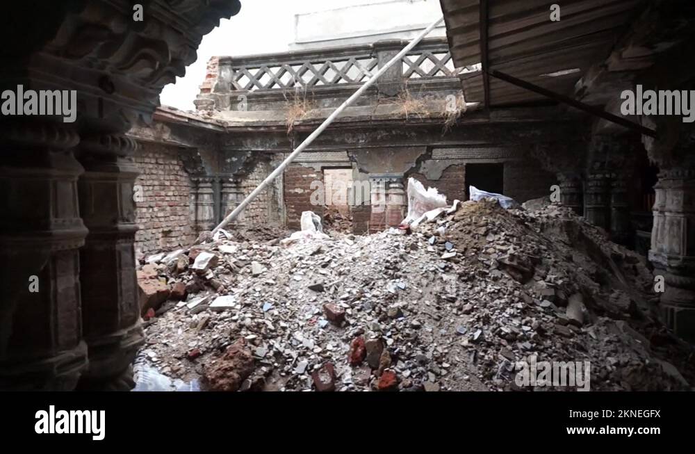 pov walking inside old damaged building in ruins, collapsed roof and ...